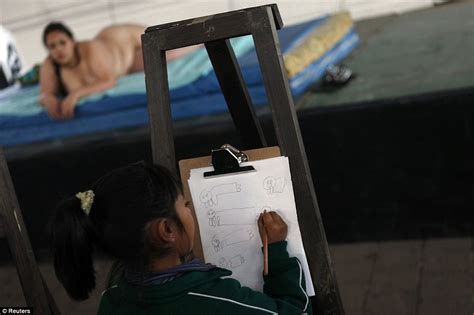 Nude Modelling A Model Poses Nude While A Girl Draws Her During An Art Workshop On Valentine S