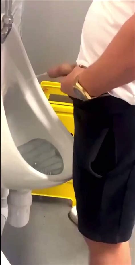 Urinal Spy Vid 68 Gold Watch And On The Phone