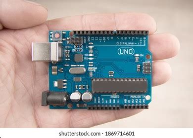 Arduino Uno Board Electronics Hand Programming Stock Photo 1869855883 Shutterstock