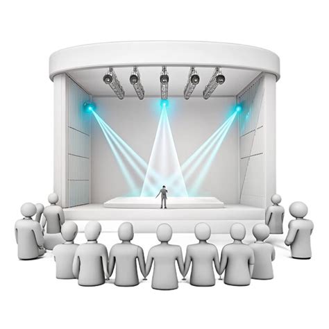 A Group Of People In Front Of A Stage With A Person Standing In Front