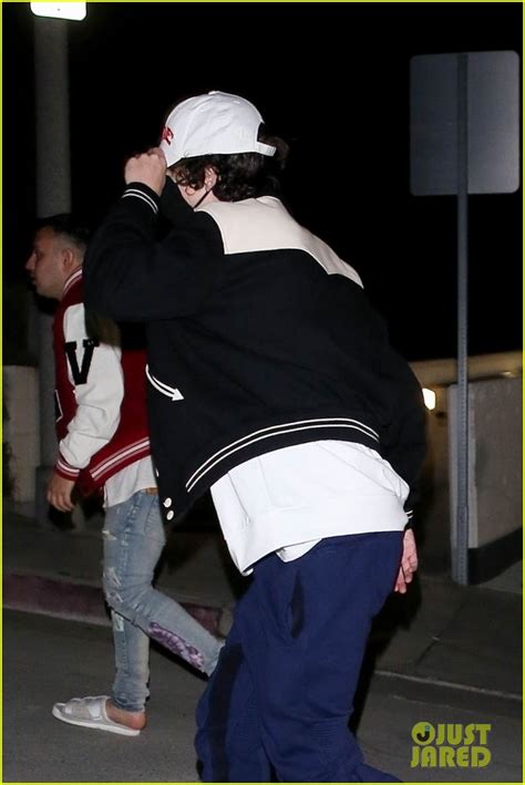 Timothee Chalamet Wears Matching Carrie Hat And T Shirt During Night Out With Friends Photo