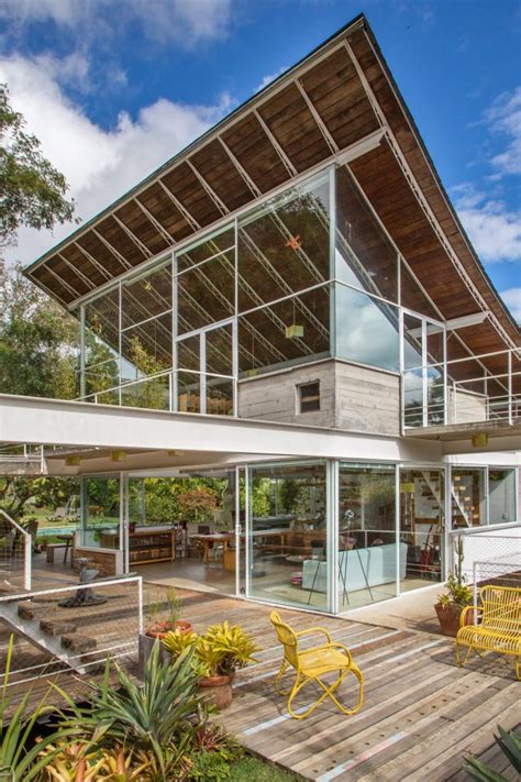 Huge Roof Curves Over House In Samambaia Designed For An Architect And Artist