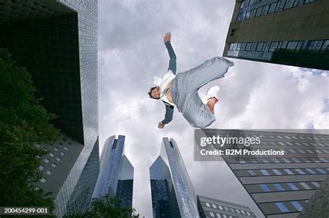 Man Jumps Off Building Photos And Premium High Res Pictures Getty Images