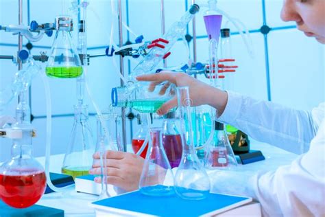 chemical experiment in science laboratory with test tube beaker and