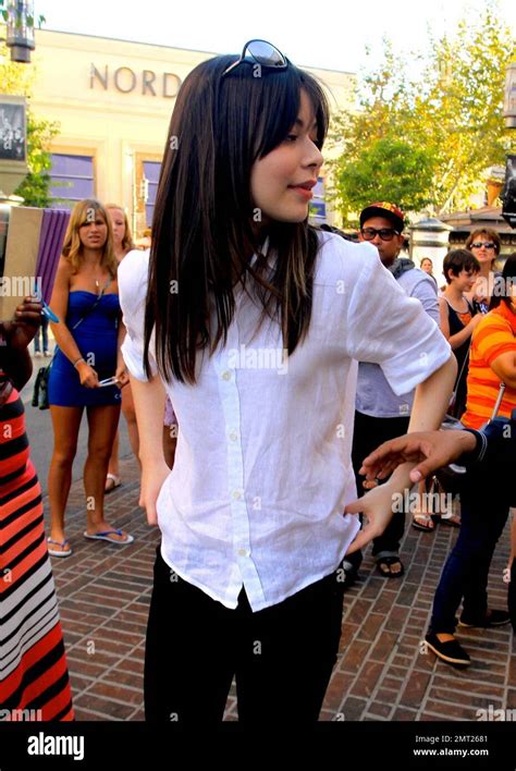 ICarly Star Miranda Cosgrove Goes Casual In A White Top And Black Pants As She Makes An