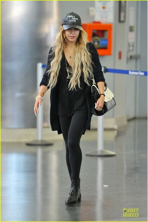 Vanessa Hudgens Sunglasses Make Her Look Red Hot At Lax Airport