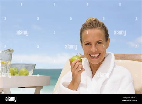 Woman Eating An Apple Stock Photo Alamy Woman Eating An Apple Stock Photo Alamy