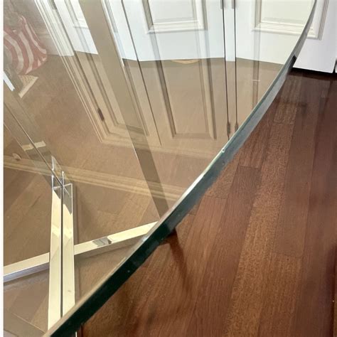 Cb2 Chrome And Glass Round Table Aptdeco