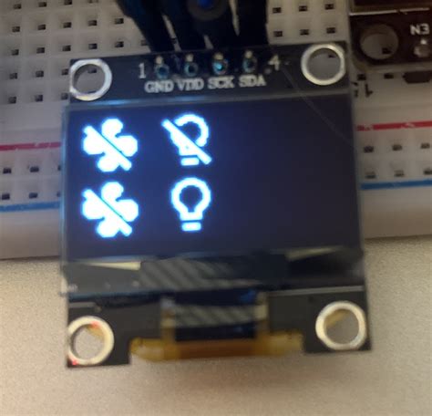 display an icon on oled screen depending on the status of a sensor