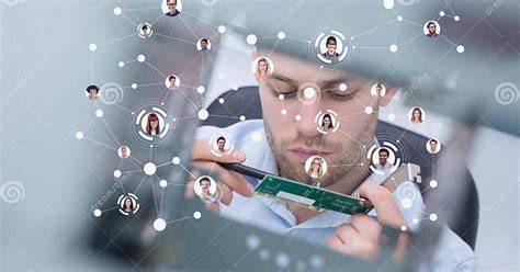 Composition Of Network Of Digital Icons And Photos Over Man Holding Circuit Board Stock Image