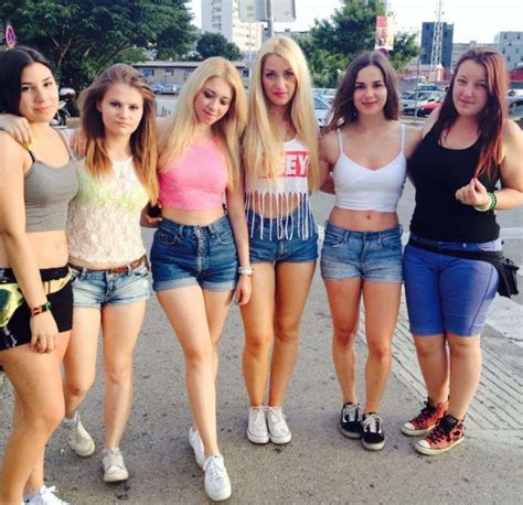 Download A Group Of Girls Posing For A Picture