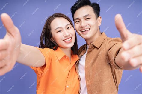 Premium Photo Photo Of Young Asian Couple On Background