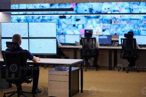Male Operator Working In A Security Data System Control Room 10827983
