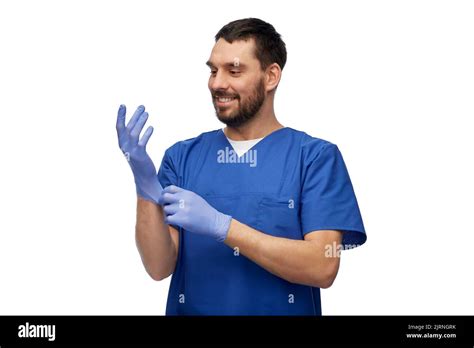 Man Putting On Latex Gloves Hi Res Stock Photography And Images Alamy