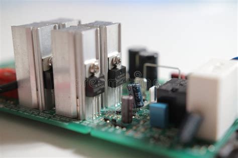 Power Supply Modern Printed Circuit Board With Electronic Components With Transistor Pcb Detail