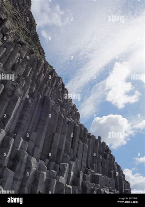 Stunning Vertical Columnar Basalt Formations Extend Against A Bright