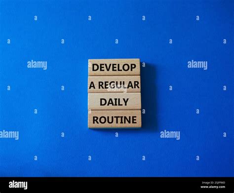 Develop A Regular Daily Routine Symbol Concept Words Develop A Regular Daily Routine On Wooden