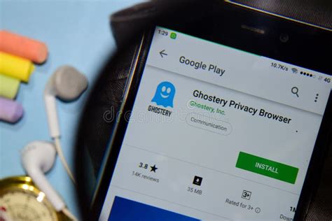 ghostery privacy browser dev app with magnifying on smartphone screen