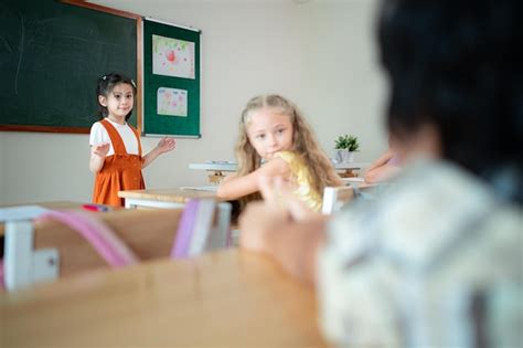 Premium Photo Teacher And Students Learn And Study In A Classroom Of