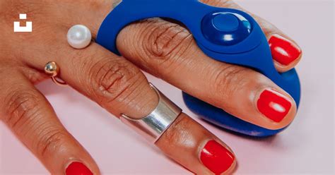 Person Holding Blue Electronic Component Photo Free Sex Image On Unsplash