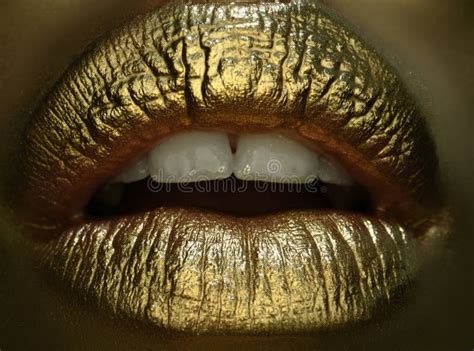 Glamour Cosmetic Golden Lipstick Closeup Lips With Metal Makeup Lips