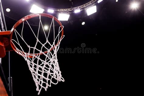 Shallow Depth Of Field Selective Focus Details With A Basketball Panel And Net Before An