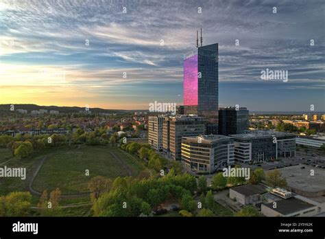 Drone View of Gdańsk s Olivia Top Star The Tallest Skyscraper Business Hub and Serene Green