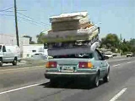7 Mattresses Strapped To Roof Of Car Youtube