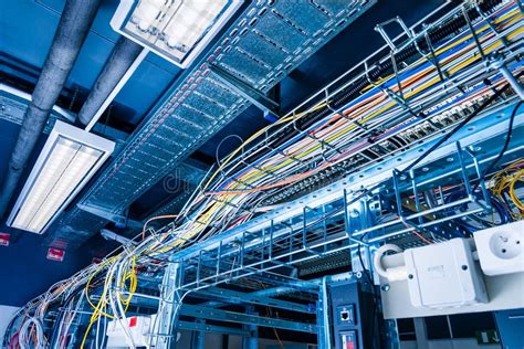 Bunch Of Network Cables In Wave Pattern Leading Across Server Ro Stock