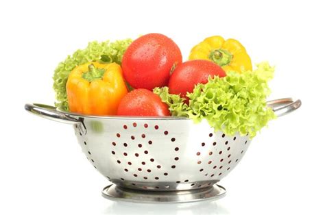 Premium Photo Fresh Vegetables In Silver Colander Isolated On White
