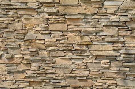 Cladding Texture Of A Stone Wall Background Of Natural Stone Materials