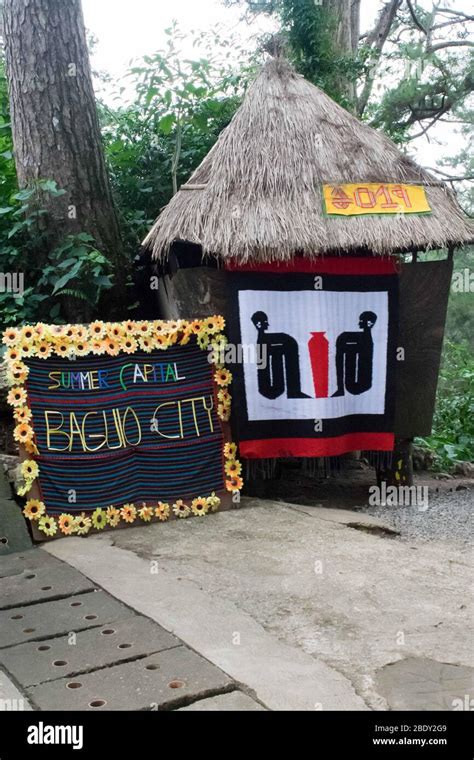 June 5, 2019-Baguio City Philippines : a wooden small house with a weaved costure and letterings ...