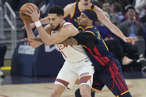 Devin Booker scores 31 points as Suns run away from Warriors for 130-105 win - Yahoo Sports