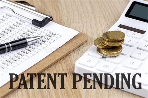 Patent Pending Text With Chart And Calculator And Coins Business Concept Stock Image Image