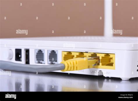 Network Router With Ethernet Cable Close Up Stock Photo Alamy
