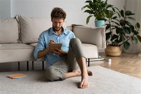 Free Photo Full Shot Man Writing In Notebook