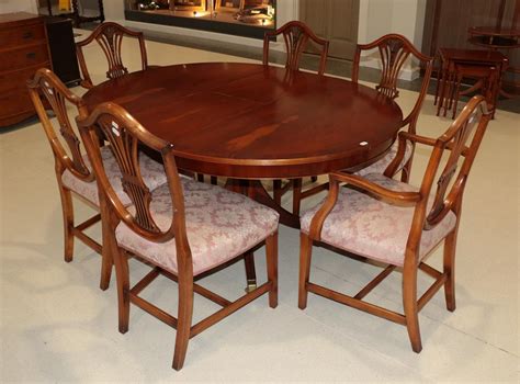 Lot 1224 A Yew Wood Veneered Single Pedestal Dining