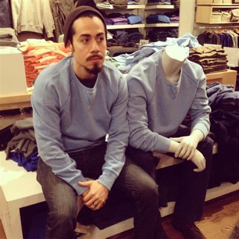 Man Poses Next To Gap Mannequins While Wearing The Exact Same Outfit