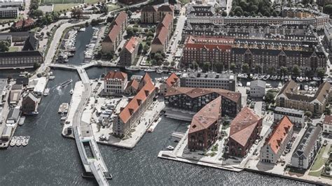 Cobe And Vilhelm Lauritzen Architects Complete Warehouse Like Housing