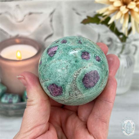 60mm Uv Reactive Ruby Fuschite Sphere Crystal Spheres For Sale