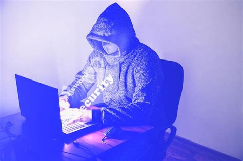 Premium Photo Man In Hoodie Is Hacking Personal Data Information Security Protection Of