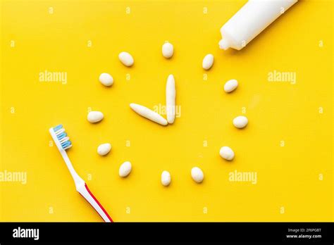 Morning Routine Concept Clock Made Of Toothpaste With Toothbrushes Top View Stock Photo Alamy