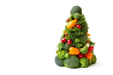 Premium Ai Image Edible Christmas Tree Shaped Vegetable On White