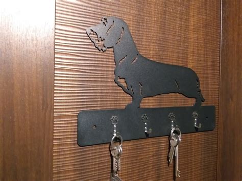 Вешалки для ключей и поводков Lasercraft