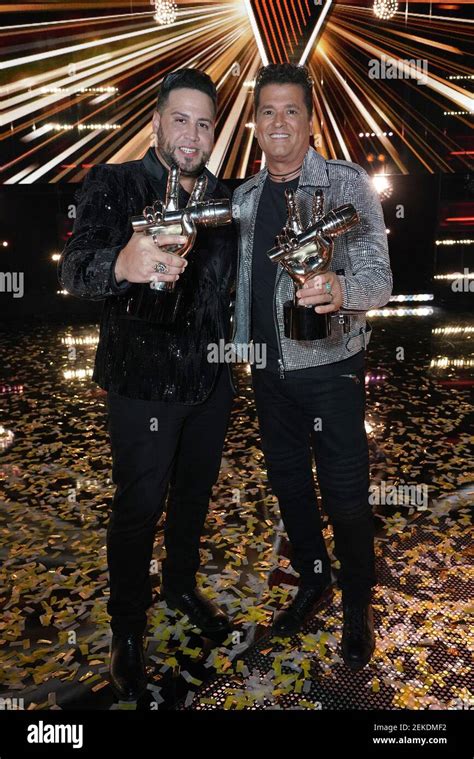 miami fl august 16 sammy colon and carlos vives are seen with the