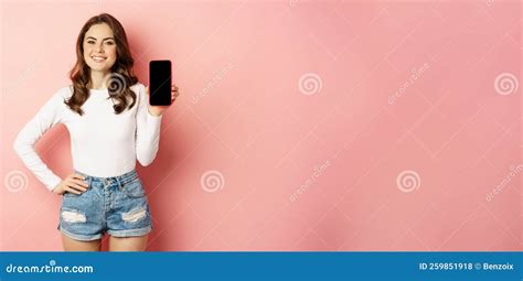 Stylish Woman Showing Mobile Phone Screen Smartphone App Interface And Smiling Demonstarting