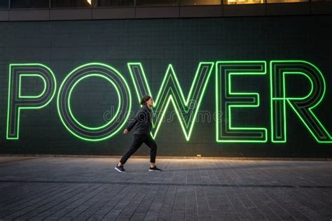 A Dynamic And Vibrant Power Wide Bold Font For Powerful Dynamic Lettering In Green Fluo Color
