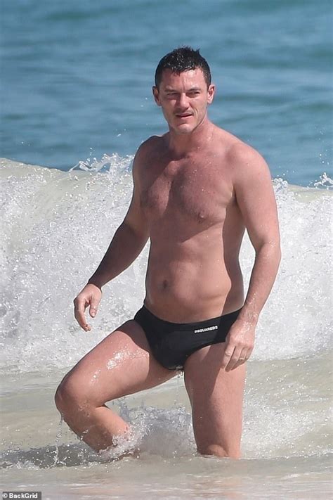 Luke Evans Shows Off His Toned And Tanned Physique In A Pair Of Very