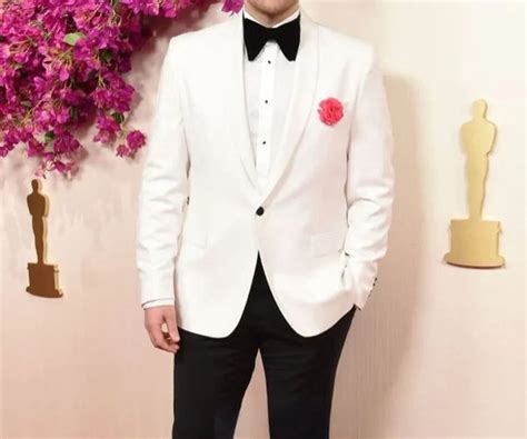 Scott Evans Captivates In Ron Tomson Ensemble At Oscars 2024 Shares V