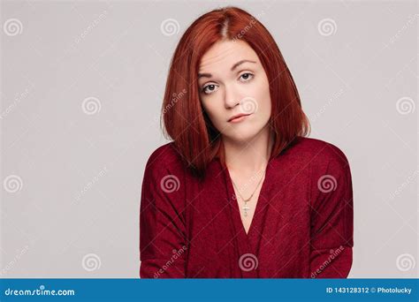 Business Woman Wearing In Red Having Passive Emotion And Looking
